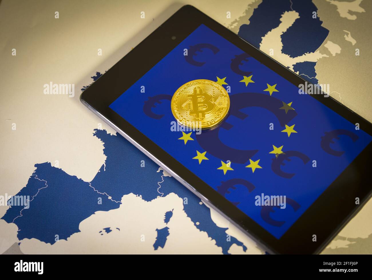 Financial concept with golden Bitcoin over smartphone, with EU flag ...