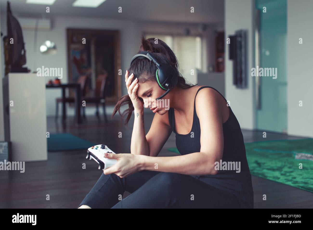 Young sad woman fail during console gaming at home Stock Photo - Alamy