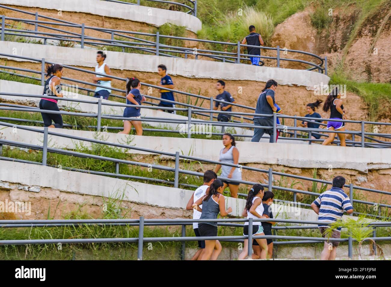 People Running at Urban Square Stock Photo - Alamy