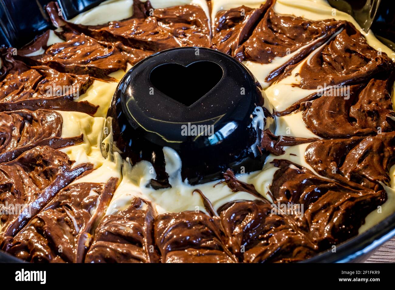 Preparation of chocolate cake close up view Stock Photo - Alamy