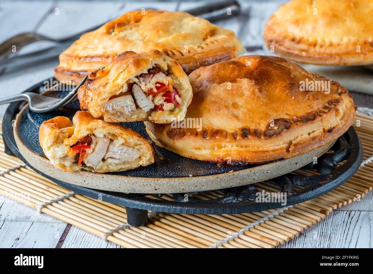 Chicken and chorizo pies in shortcrust pastry Stock Photo - Alamy