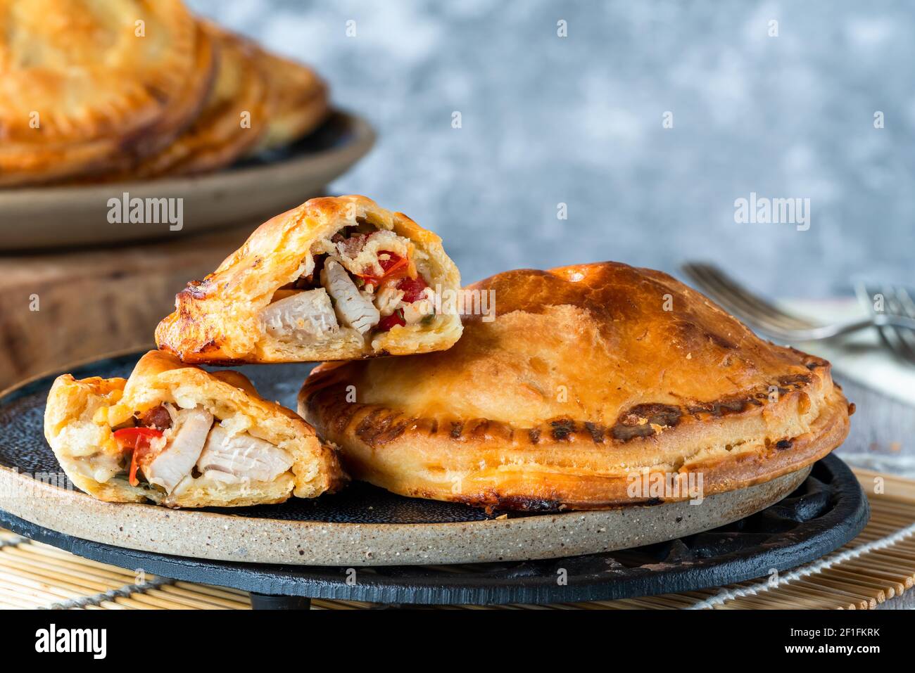 Chicken and chorizo pies in shortcrust pastry Stock Photo - Alamy