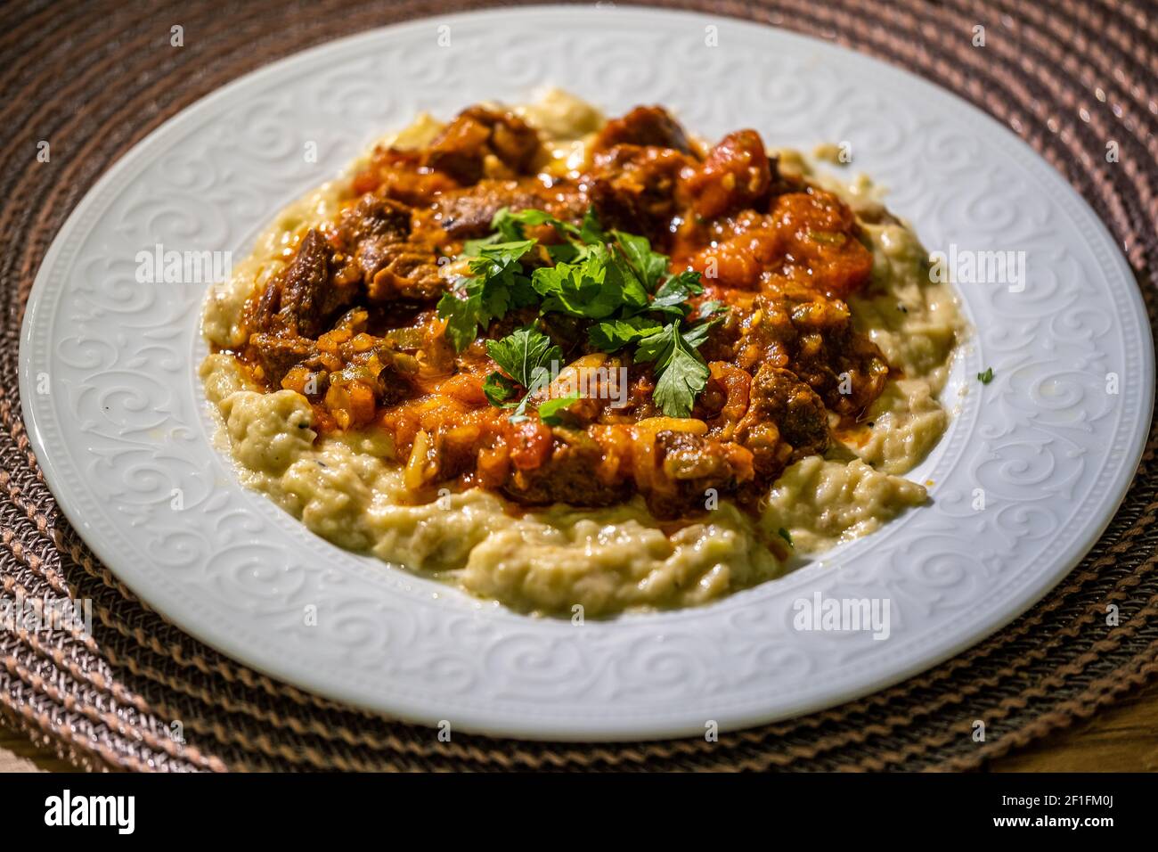 Eggplant puree with yoghurt served with seasoned ground meat Stock ...