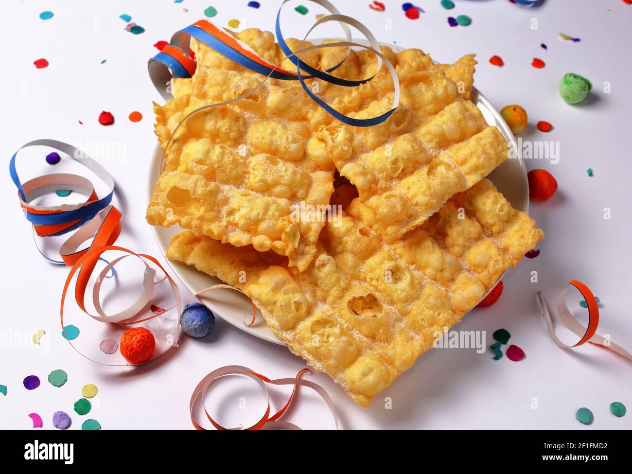 Italian crostoli. Carnival sweets on a light background Stock Photo - Alamy