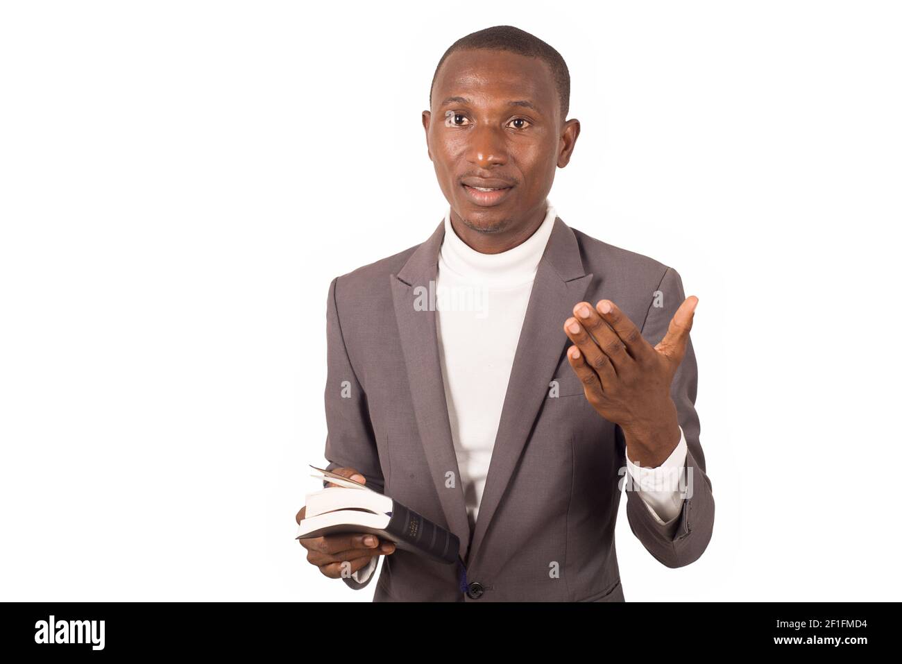 Young african american man reading holy hi-res stock photography and ...