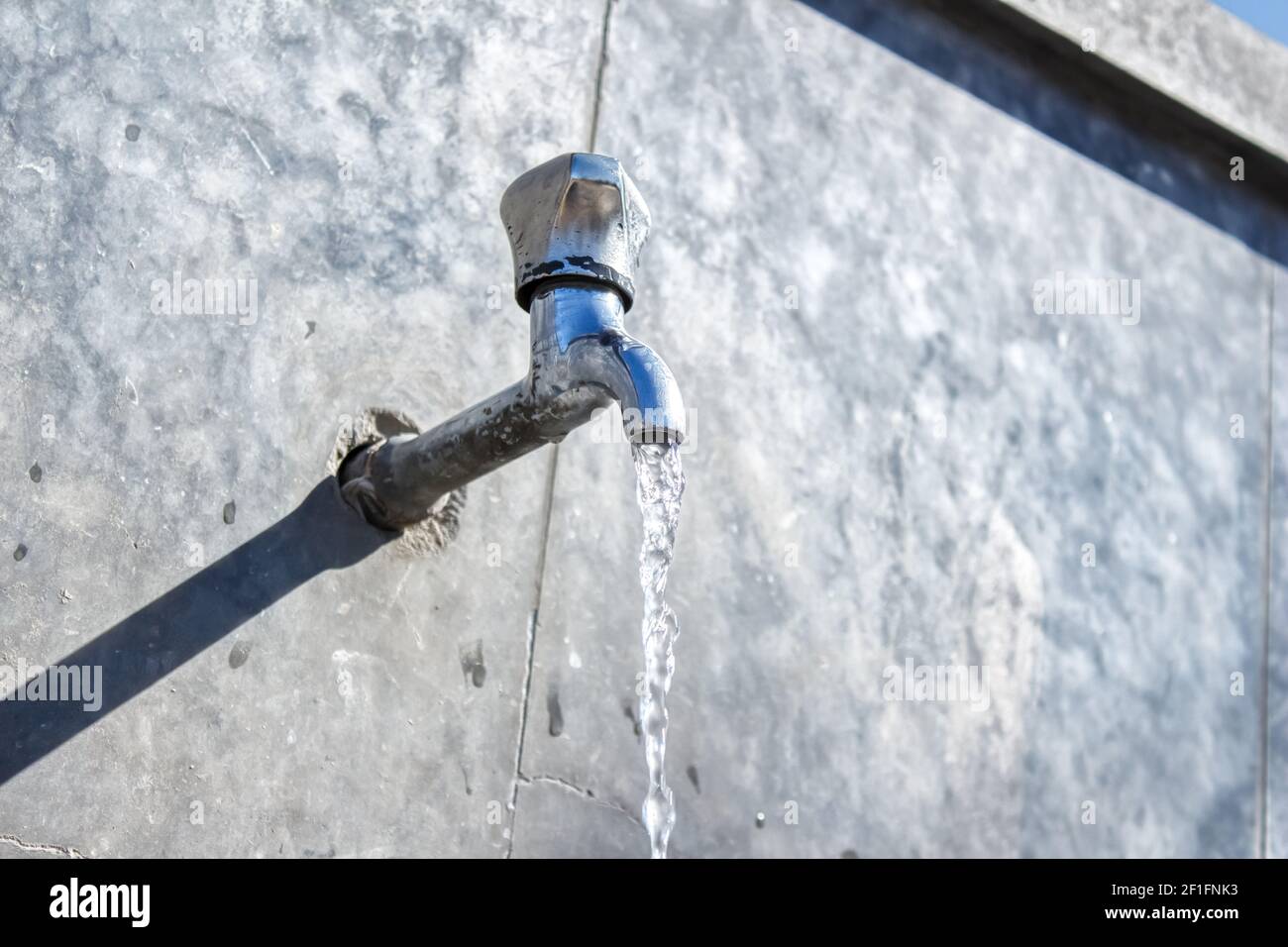 Water running from the tap Stock Photo - Alamy