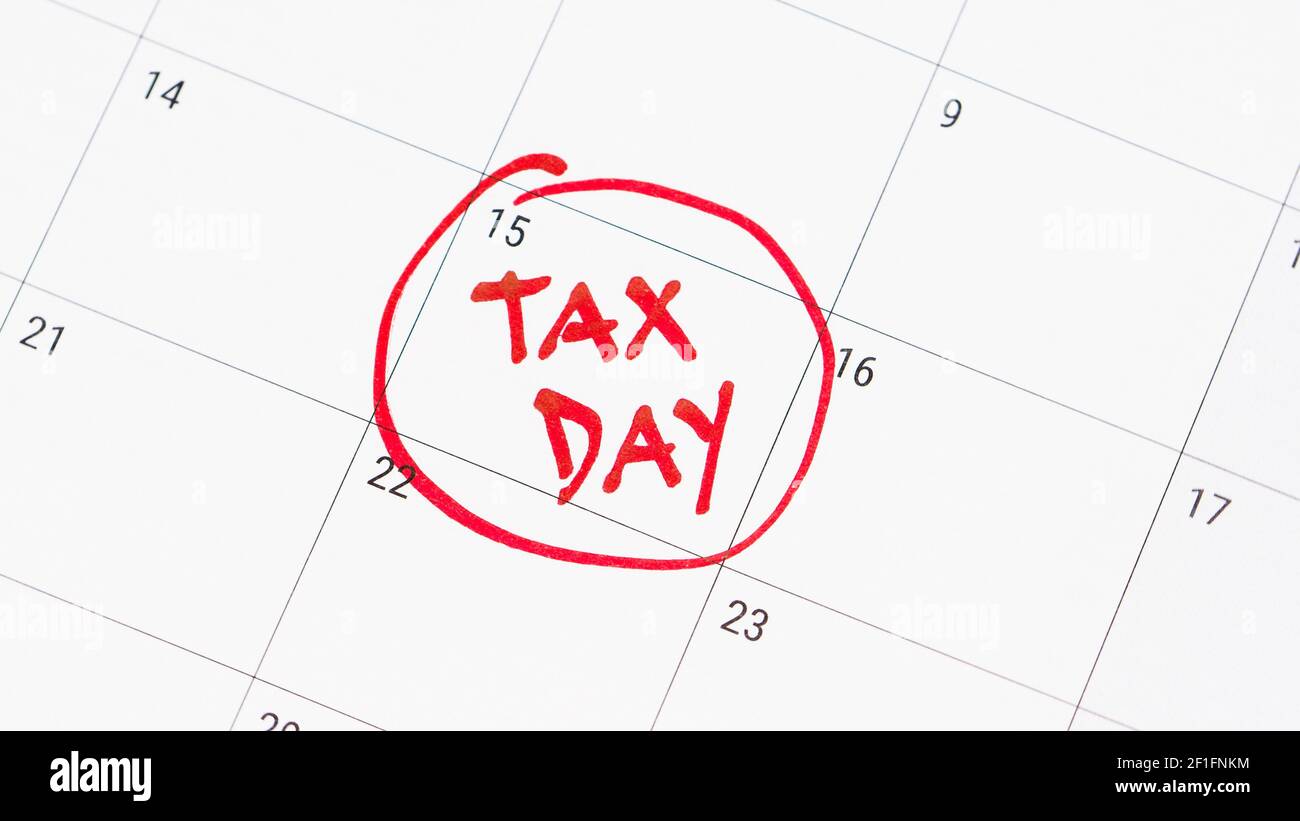 Tax day marked on calendar Stock Photo - Alamy