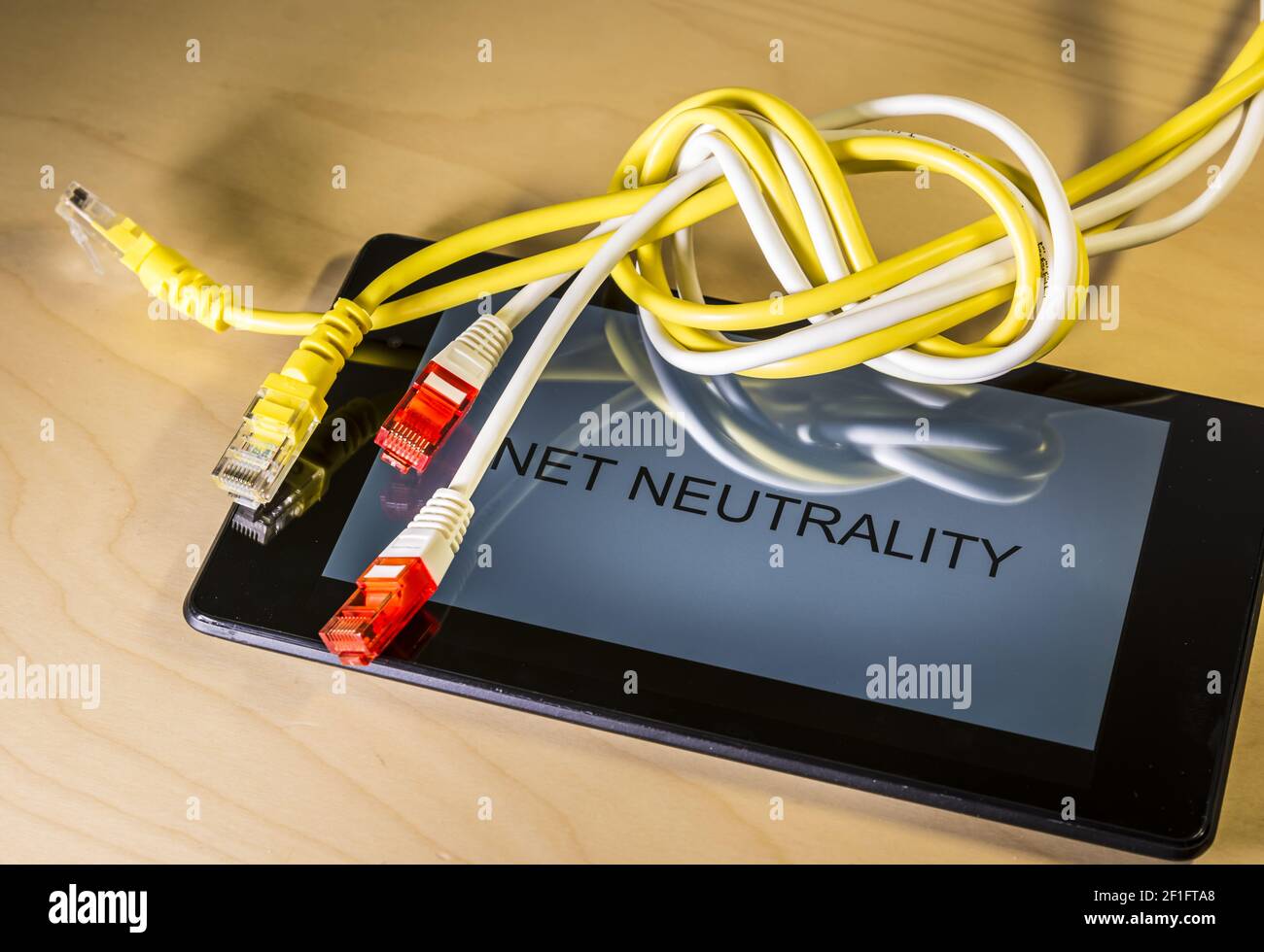 Knotted net cable over a smartphone Stock Photo - Alamy