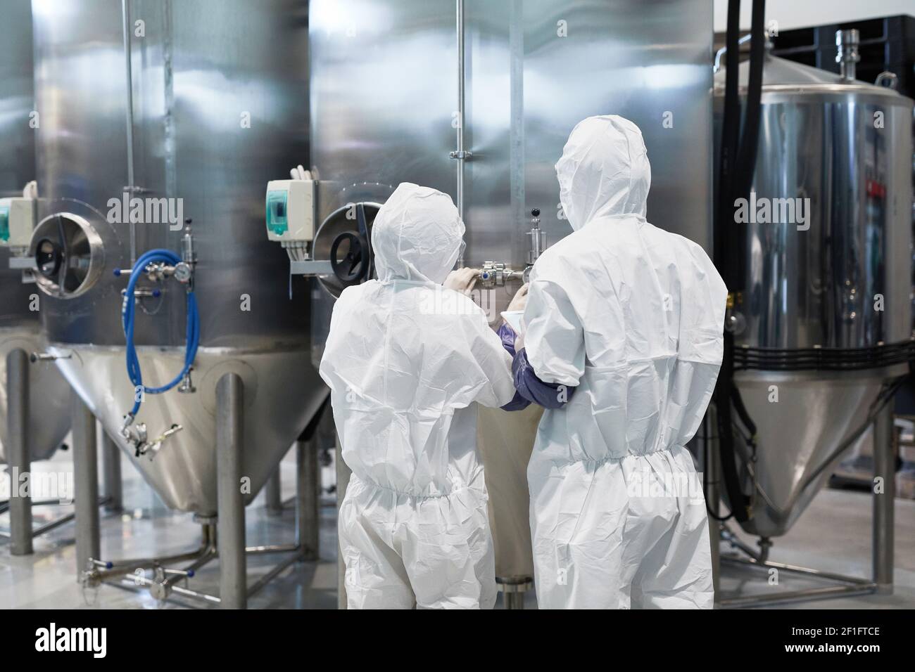 Chemical hazard suits hi-res stock photography and images - Alamy