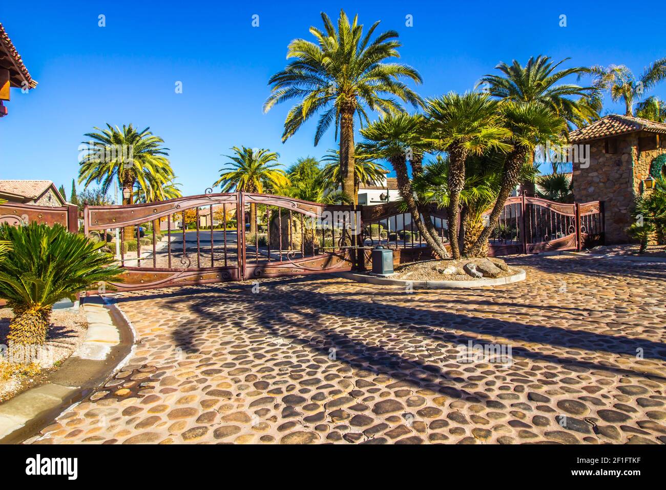 Entrance And Exit Metal Security Gates In Subdivision Stock Photo - Alamy