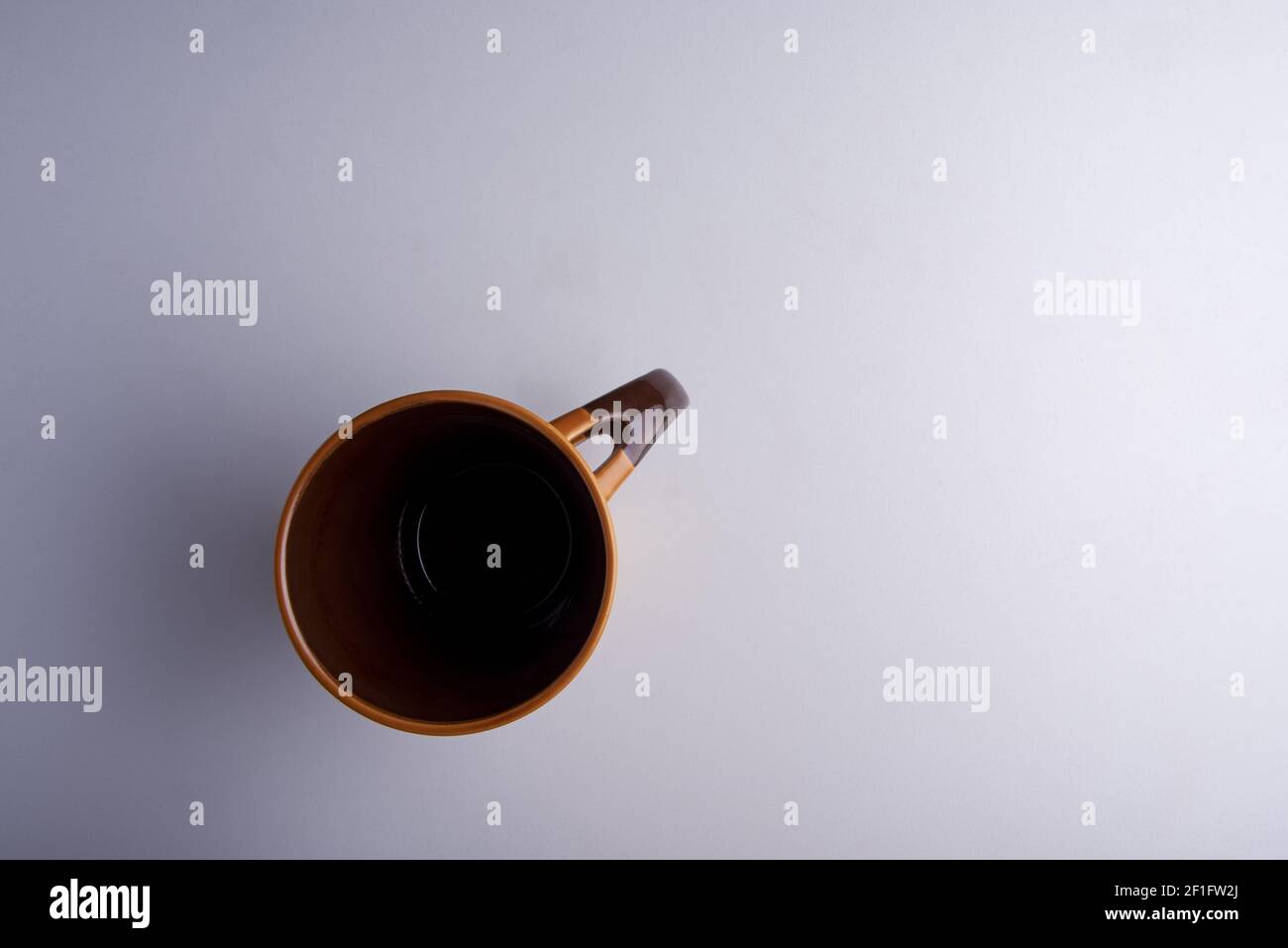 A top view of an empty brown coffee cup or tea cup on the table Stock ...