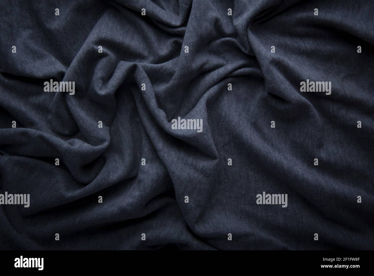 A top view of wrinkled and grooved blue cloth texture Stock Photo - Alamy