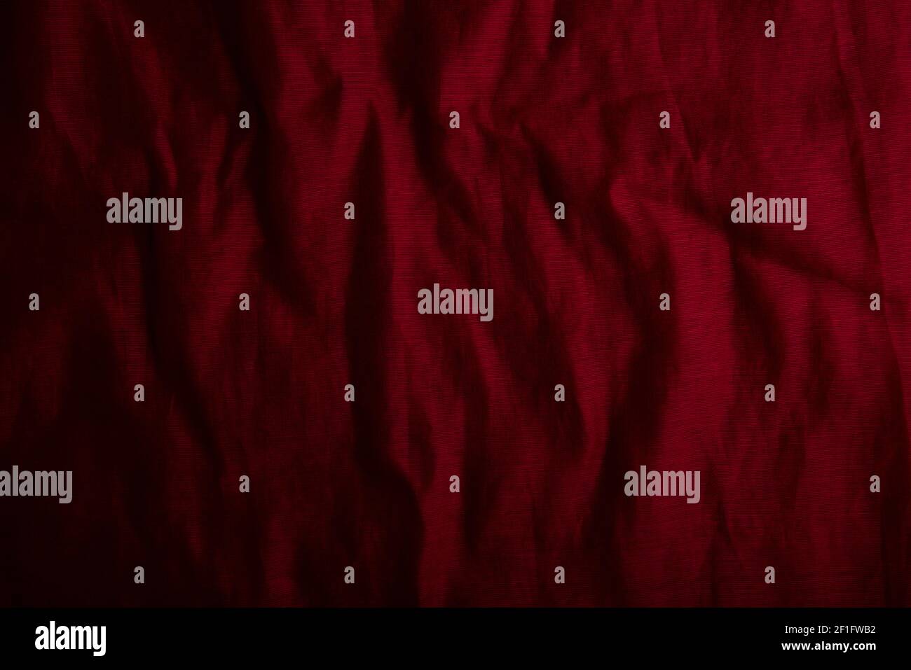 A top view of wrinkled and grooved red cloth texture Stock Photo - Alamy