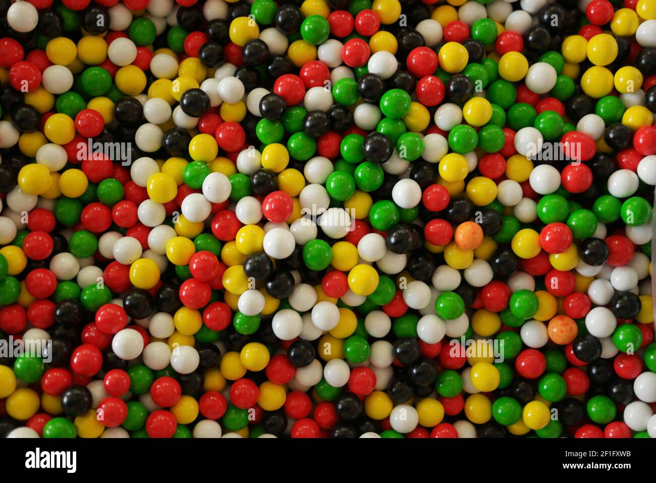 Assorted gum balls close up Stock Photo - Alamy
