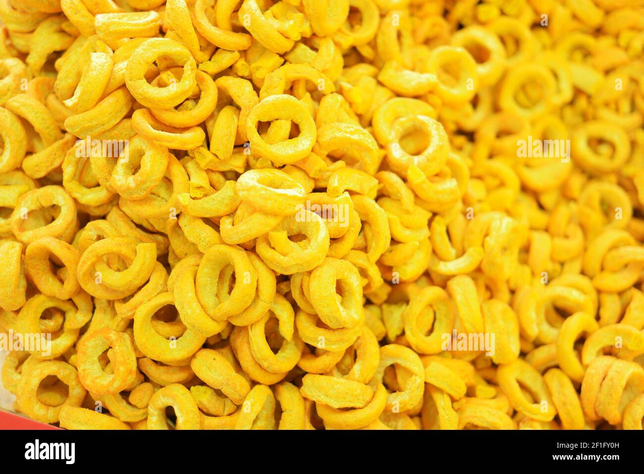 Pile of crispy corn rings close up Stock Photo - Alamy
