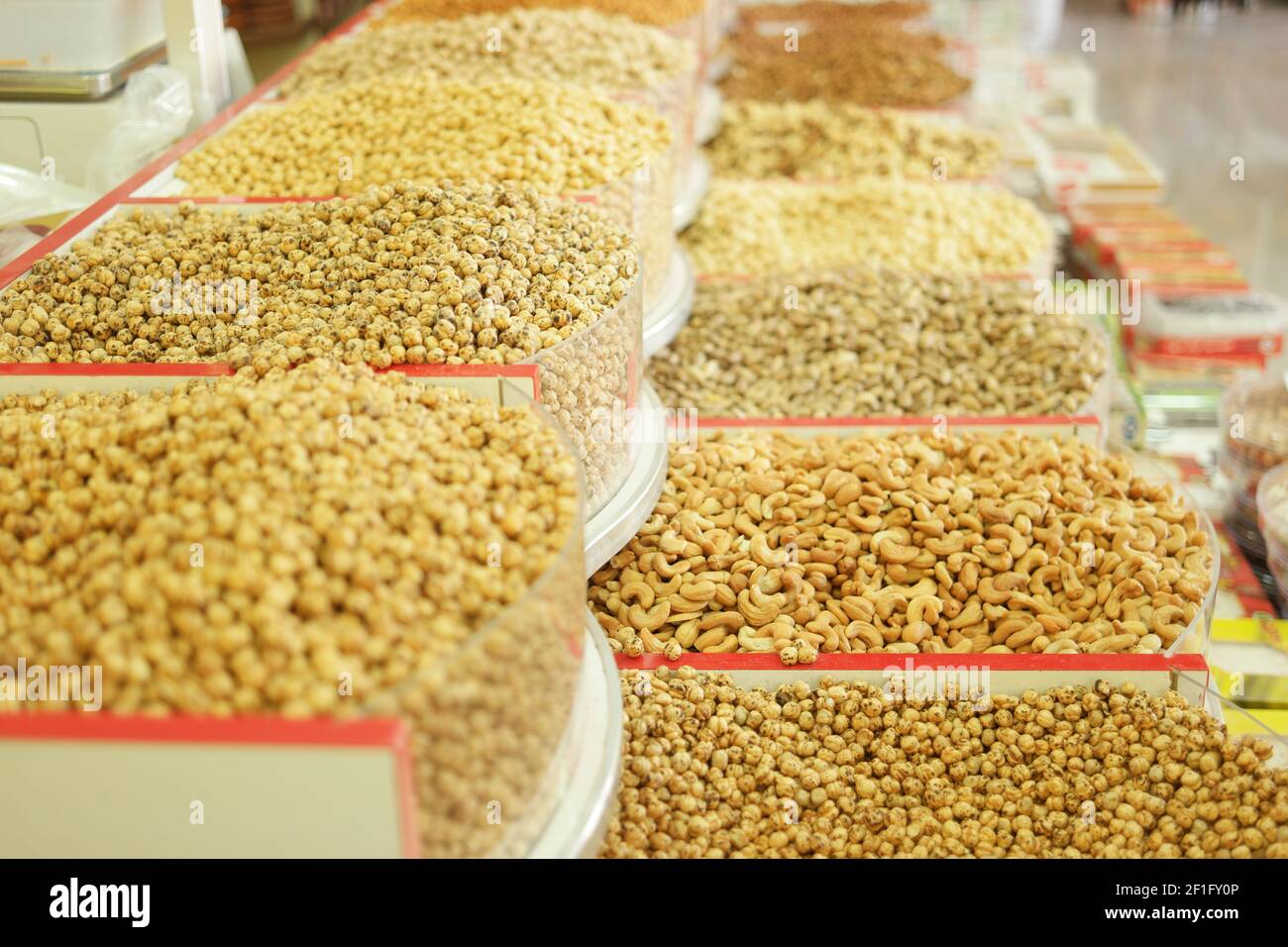 Display of organic nuts at market store Stock Photo - Alamy