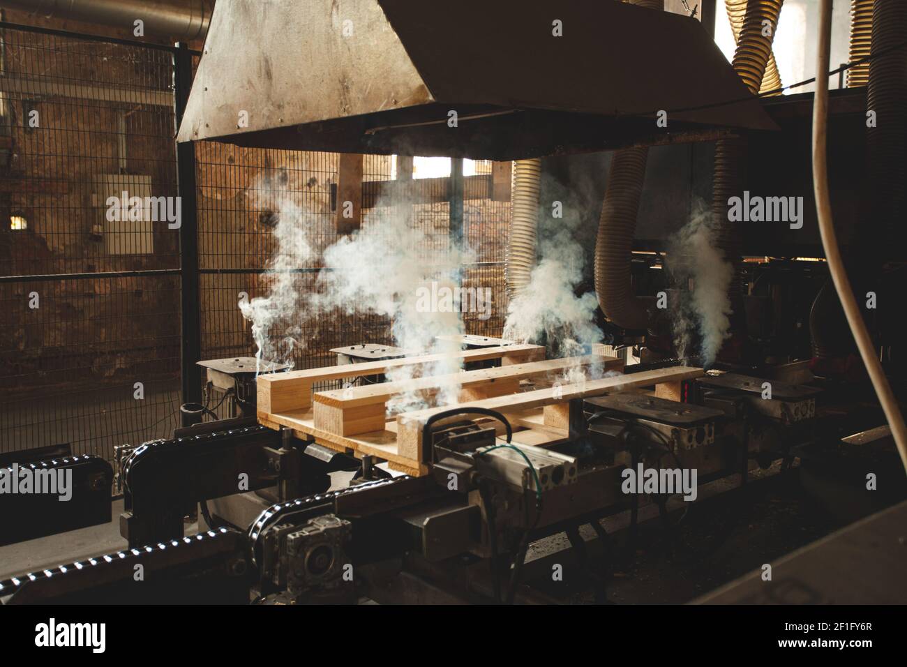 The process of industrial steaming of the wood Stock Photo - Alamy