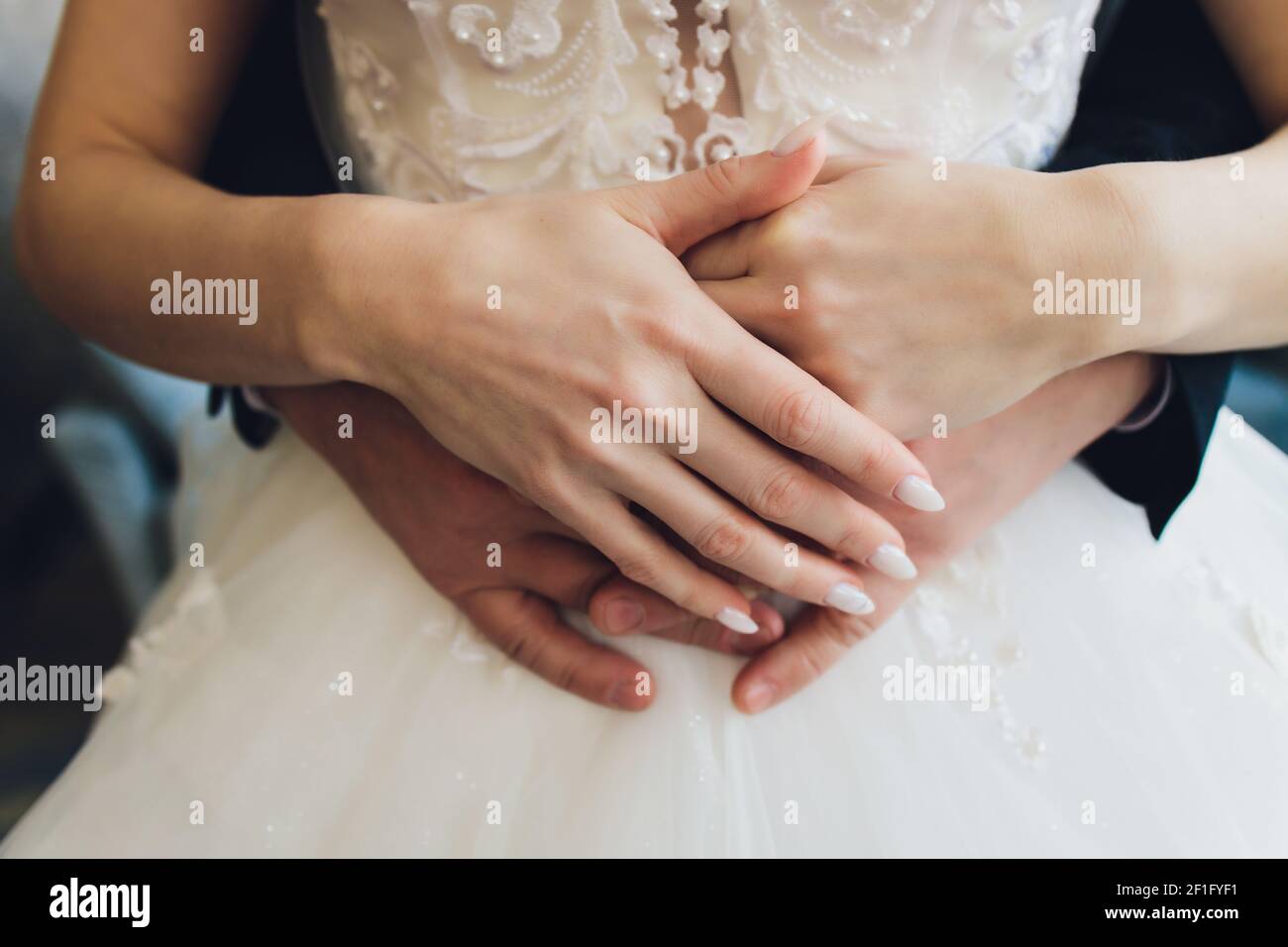 Arm around womans back hi-res stock photography and images - Alamy