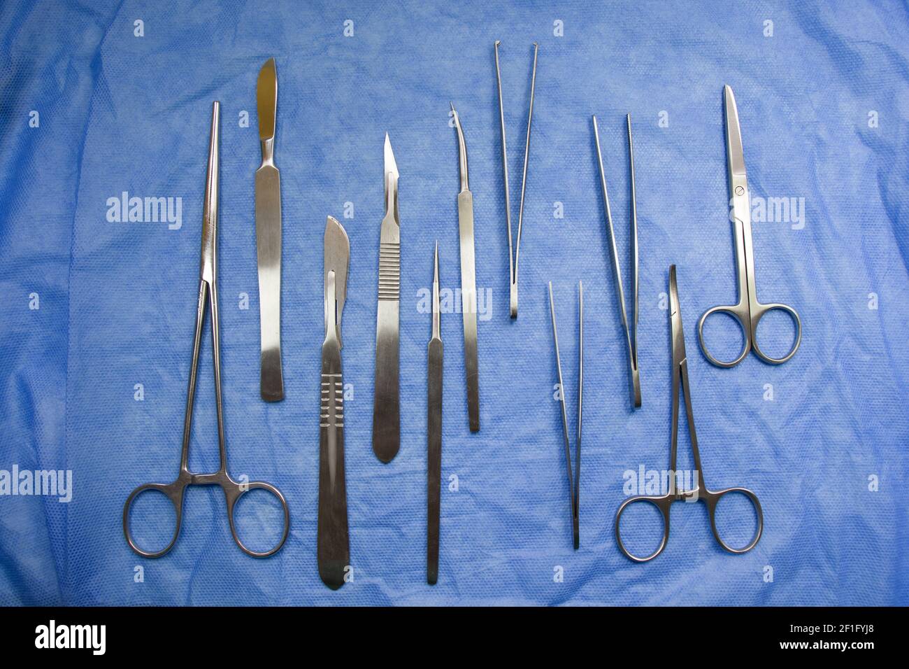 A top view of a dissection kit on the table in the hospital under the ...