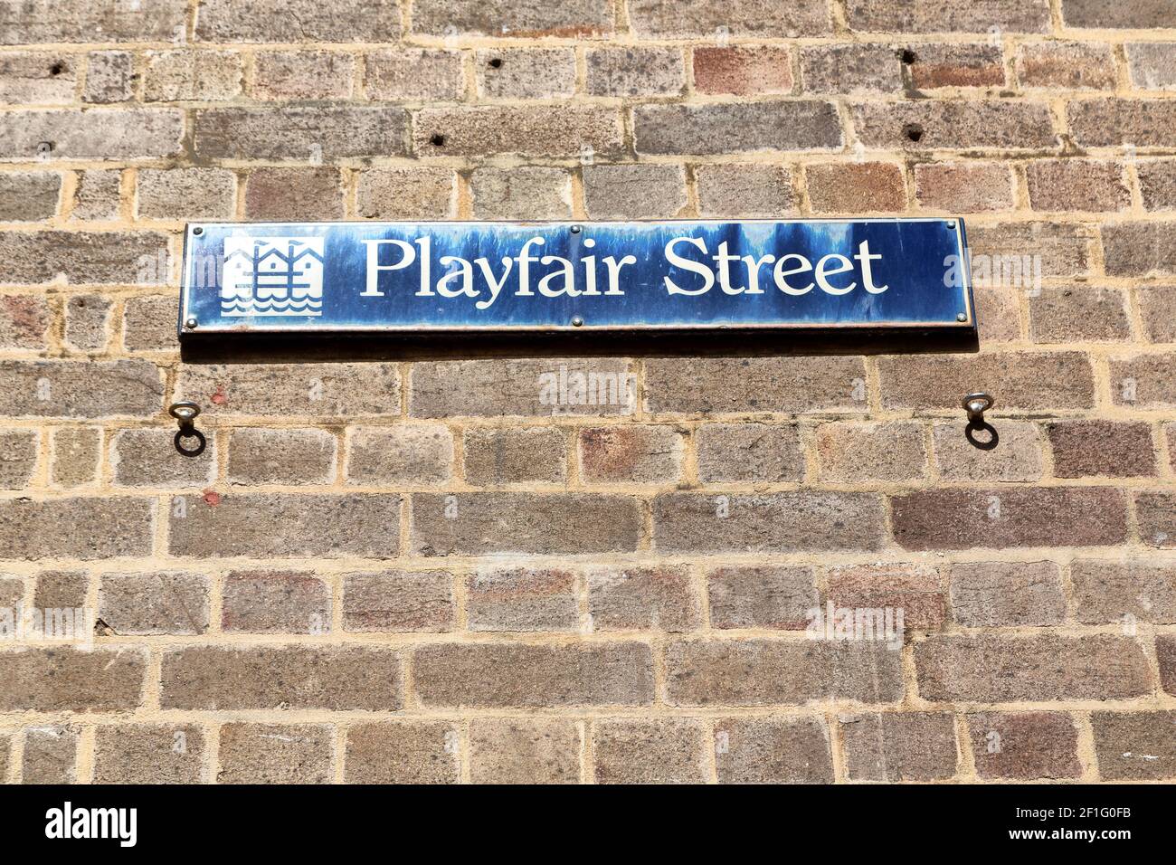 In the wall the sign of playfair street Stock Photo - Alamy