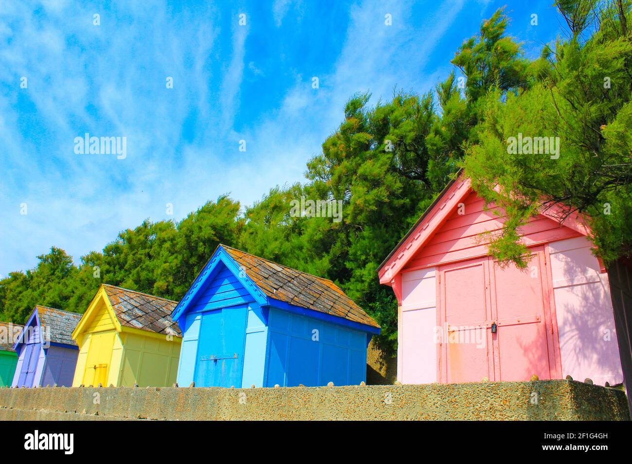 Colorful bungalows on the beach on nice summer day,Folkestone ...