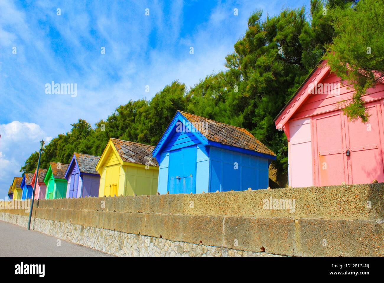 Colorful bungalows on the beach on nice summer day,Folkestone ...