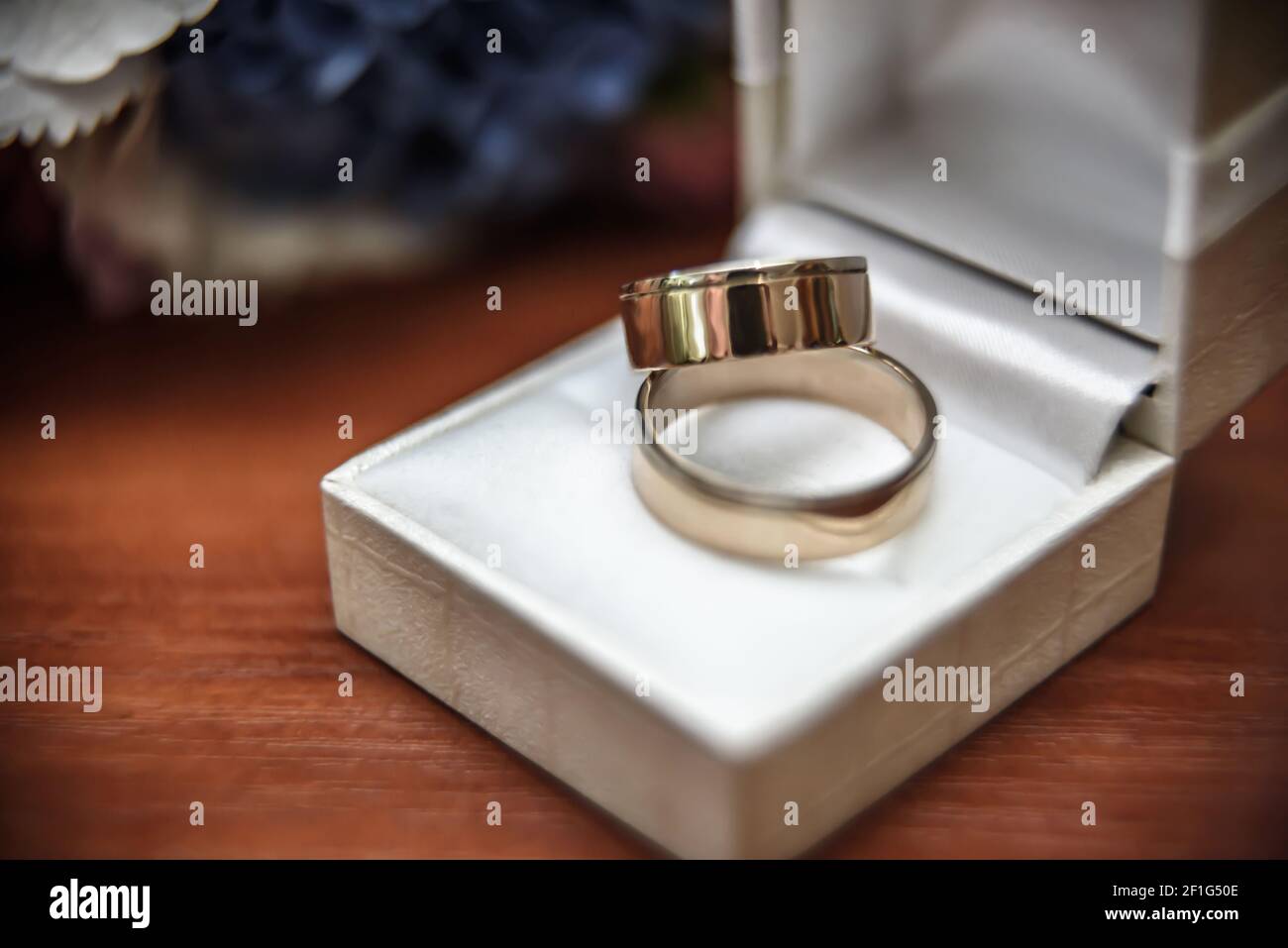 Wedding ring on the table Stock Photo - Alamy