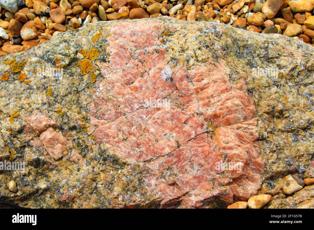 Colorful stone at the beach of Folkestone town- a port town on the ...