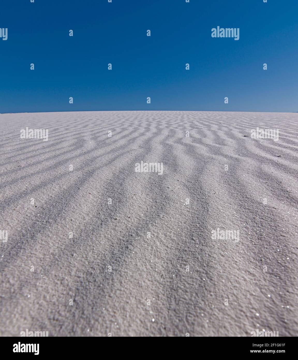 White sand dunes showing wind ripples in formations of gypsum hills at ...