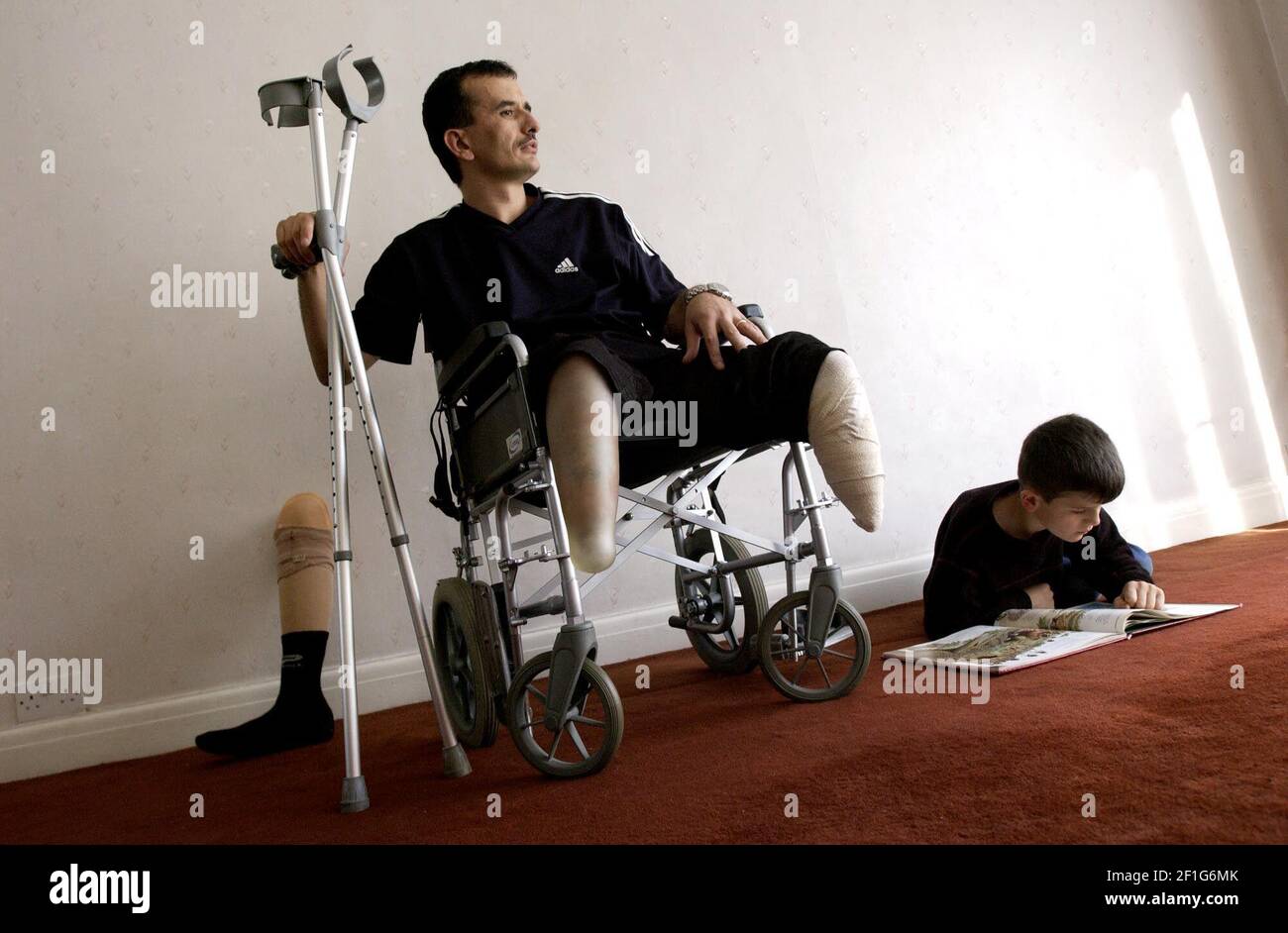 Mr Kujtim Morina with his one of his four children Kimet. The family ...