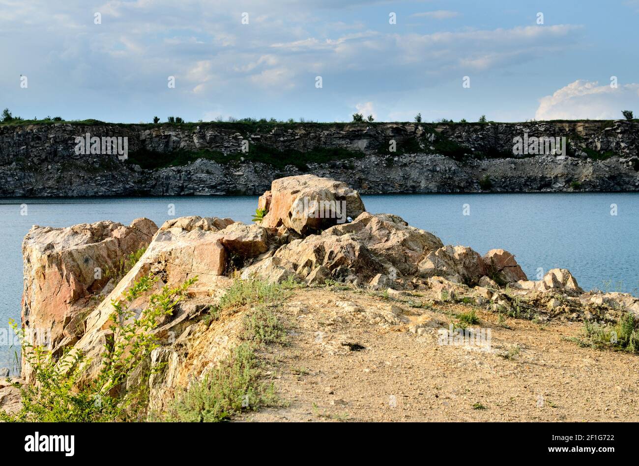 Flooded industrial granite career Stock Photo - Alamy