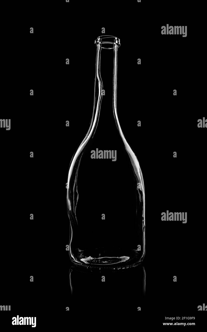 Transparent bottle of brandy Stock Photo - Alamy