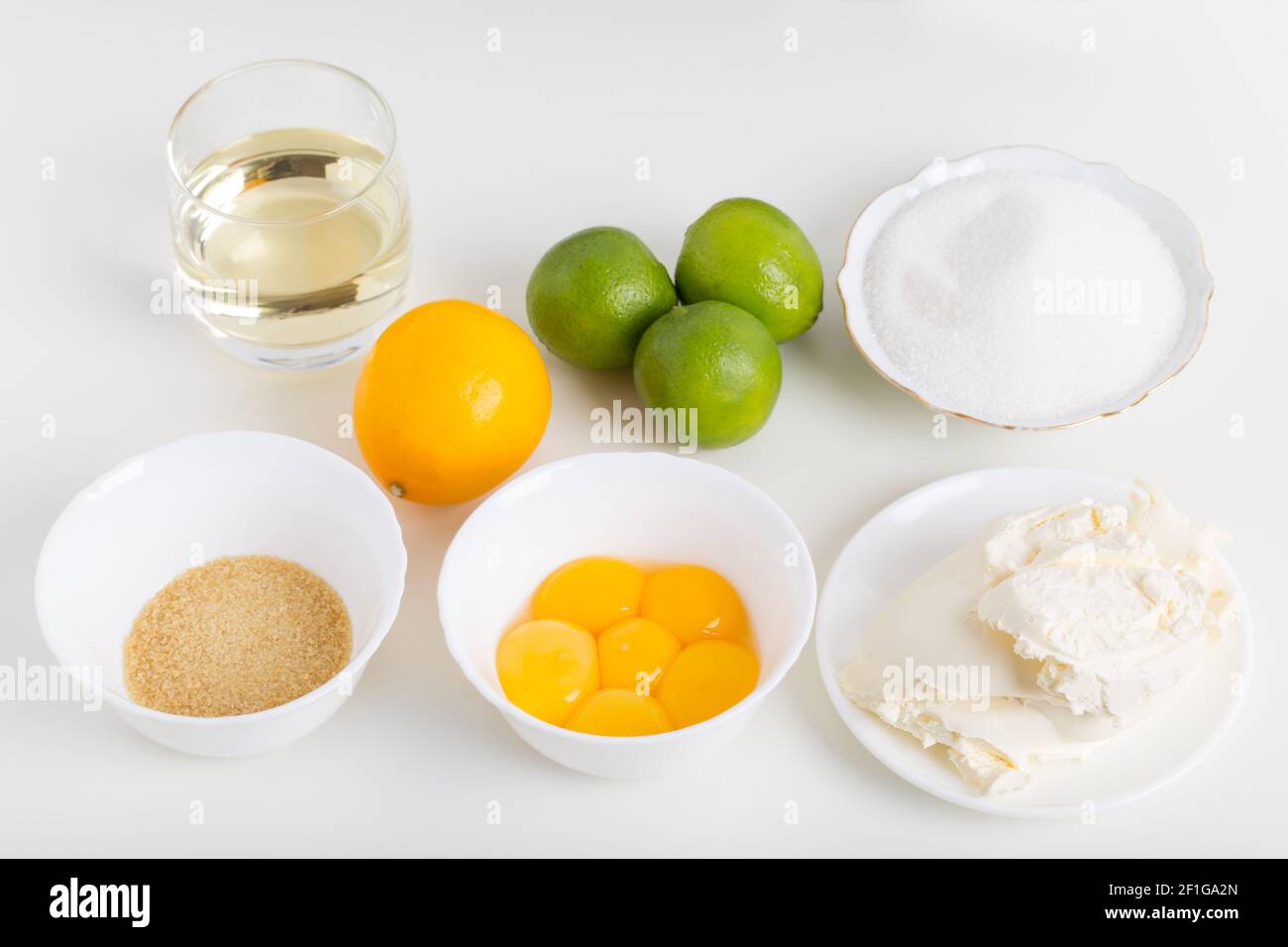 Ingredients for baking cake. Located on a white background Stock Photo ...