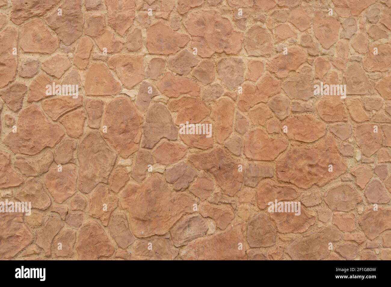 Brown stone wall for texture Stock Photo - Alamy