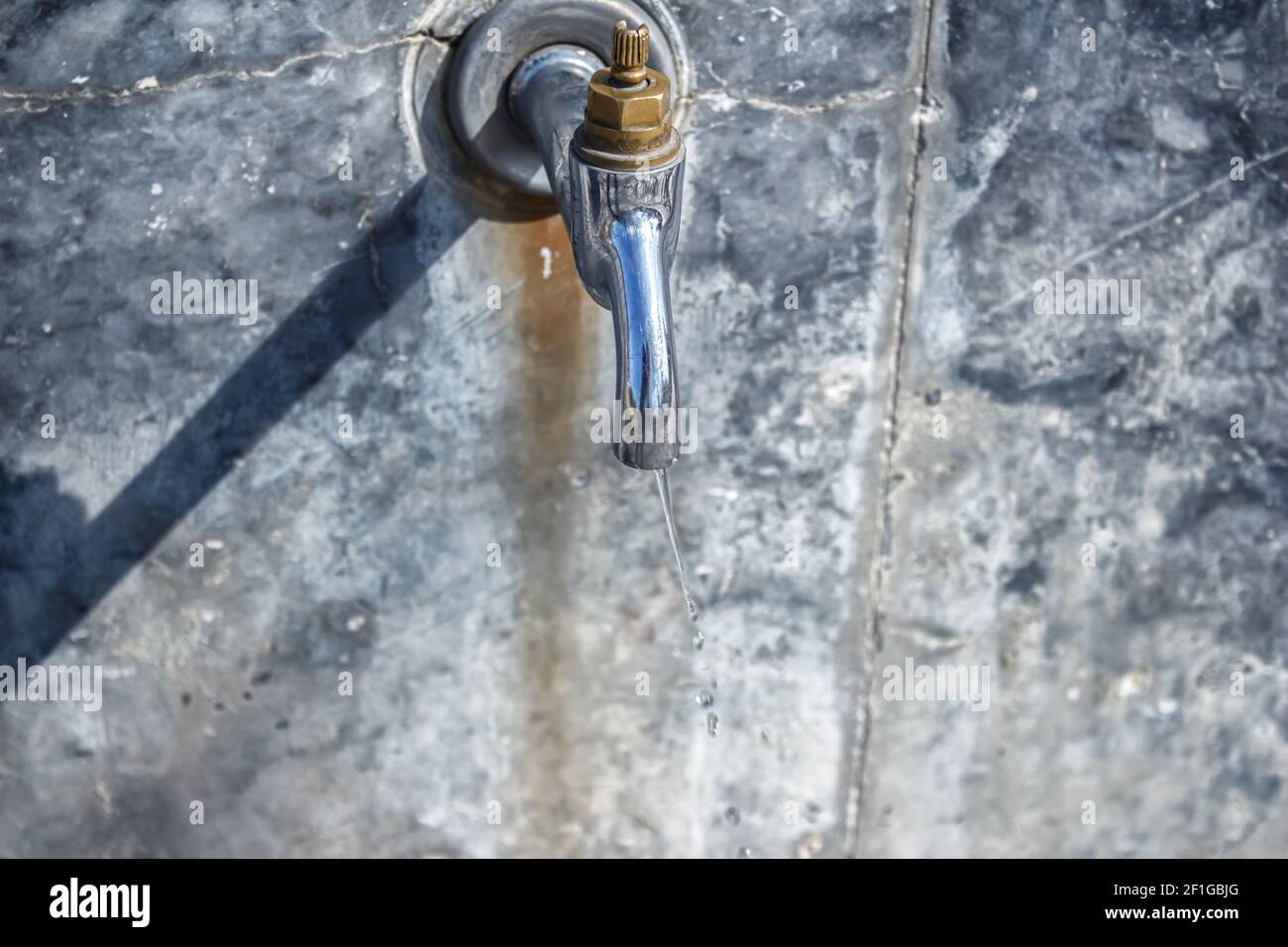 Water running from the tap Stock Photo - Alamy