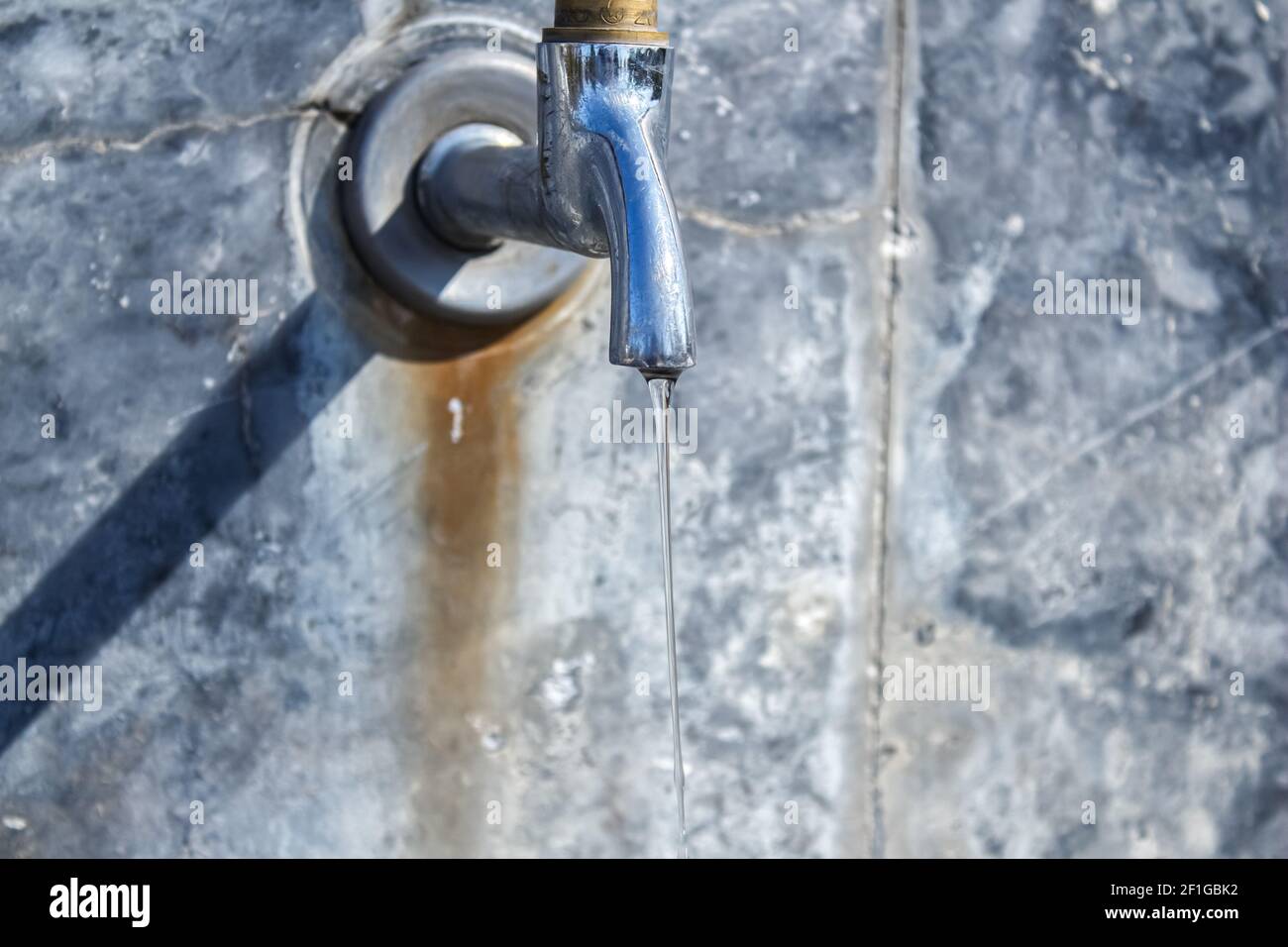Water running from the tap Stock Photo - Alamy