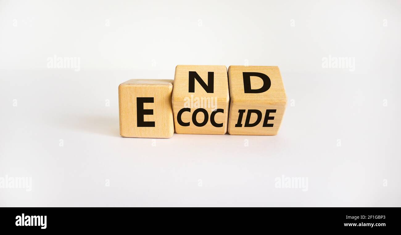 End ecocide symbol. Turned wooden cubes with words end ecocide ...