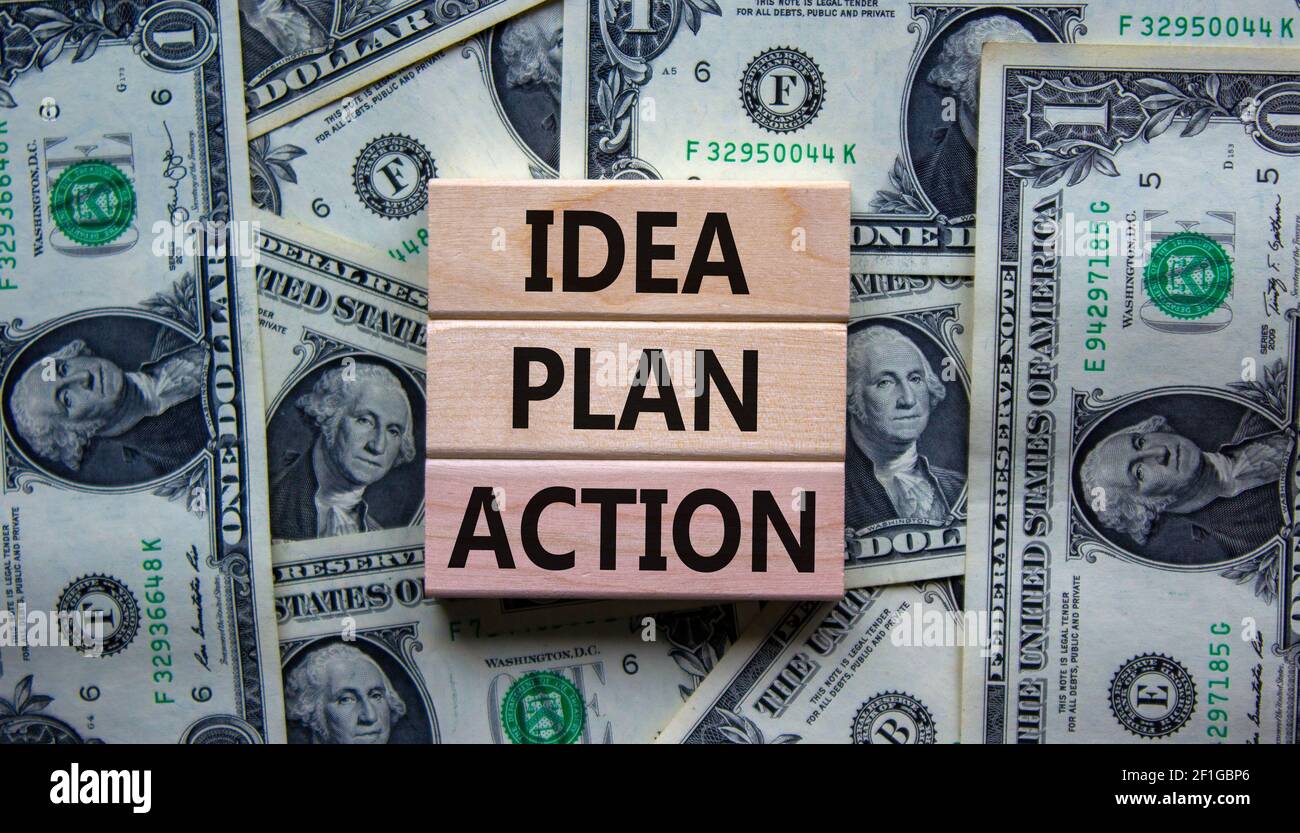 Idea, plan, action symbol. Wooden blocks form the words 'Idea, plan, action' on beautiful ...