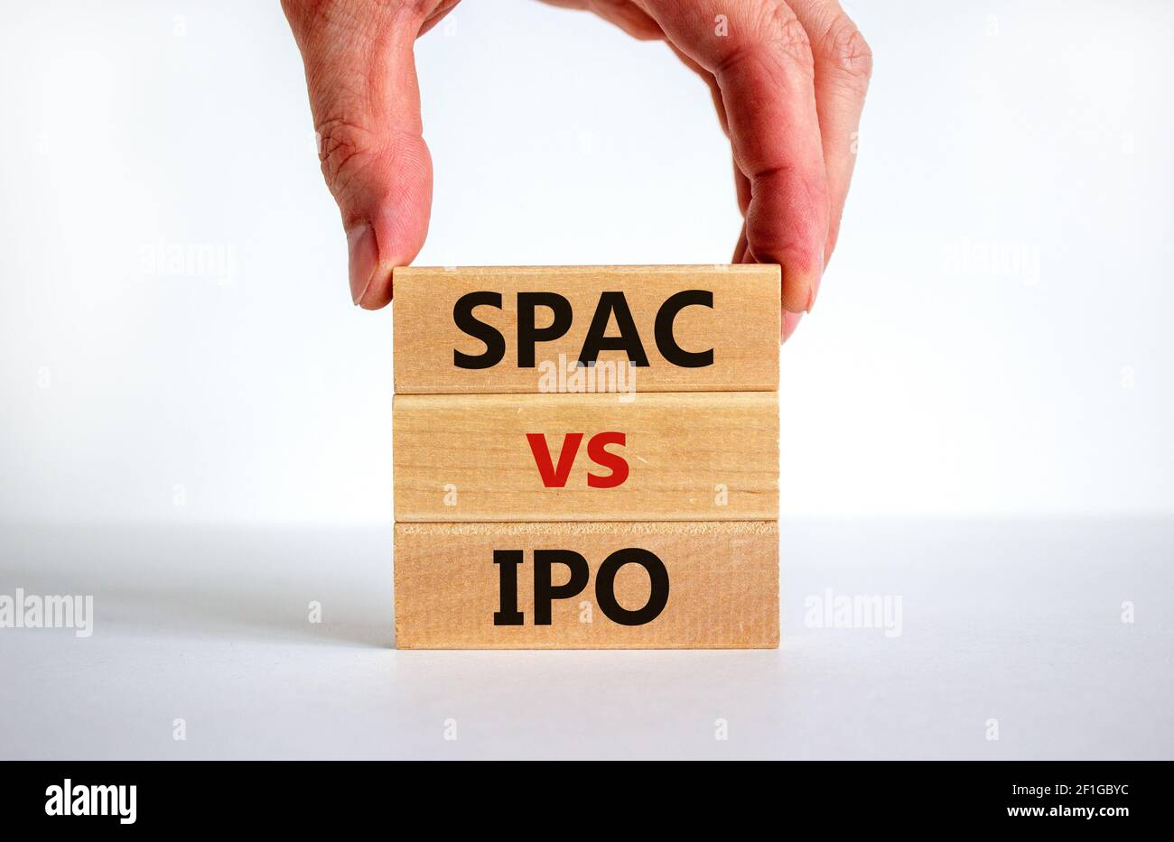 SPAC vs IPO symbol. Blocks with words 'SPAC, special purpose ...