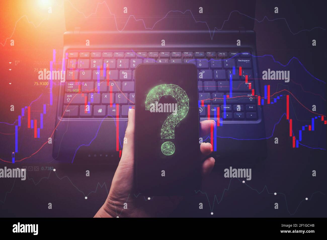 Smart phone in hand with laptop with Question mark hologram and digital ...