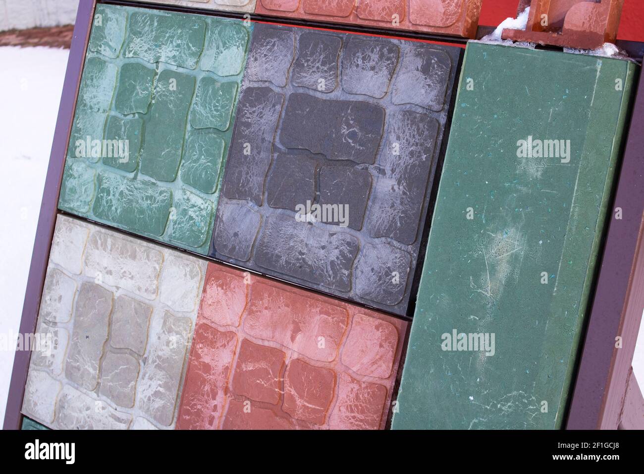 Paving slabs of different colors in a shop window Stock Photo - Alamy
