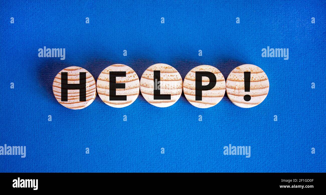 Support and help symbol. Wooden circles with the word 'help'. Business ...