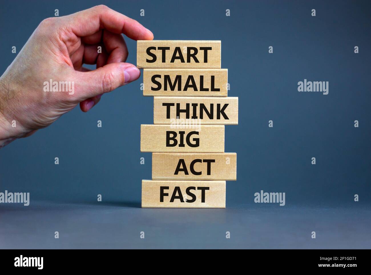 Start small think big symbol. Words 'Start small think big act fast' on ...
