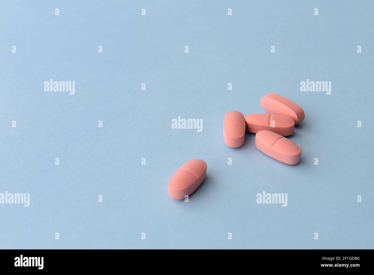 Vitamin tablets pink blue hi-res stock photography and images - Alamy