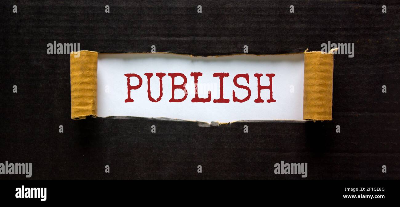 Publish symbol. The word 'Publish' appearing behind torn black paper ...