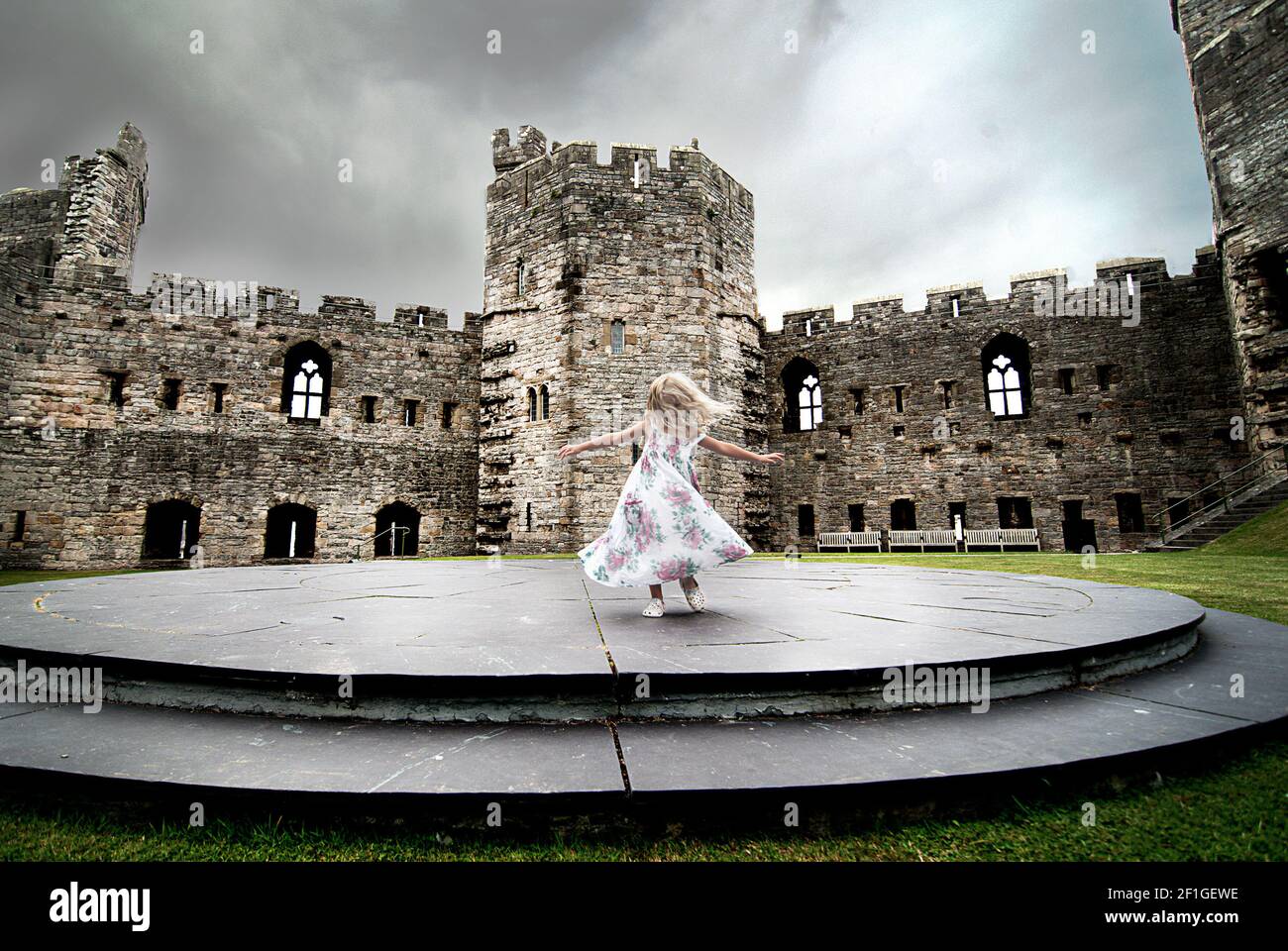 Girl Spinning Around in Castle Stock Photo - Alamy