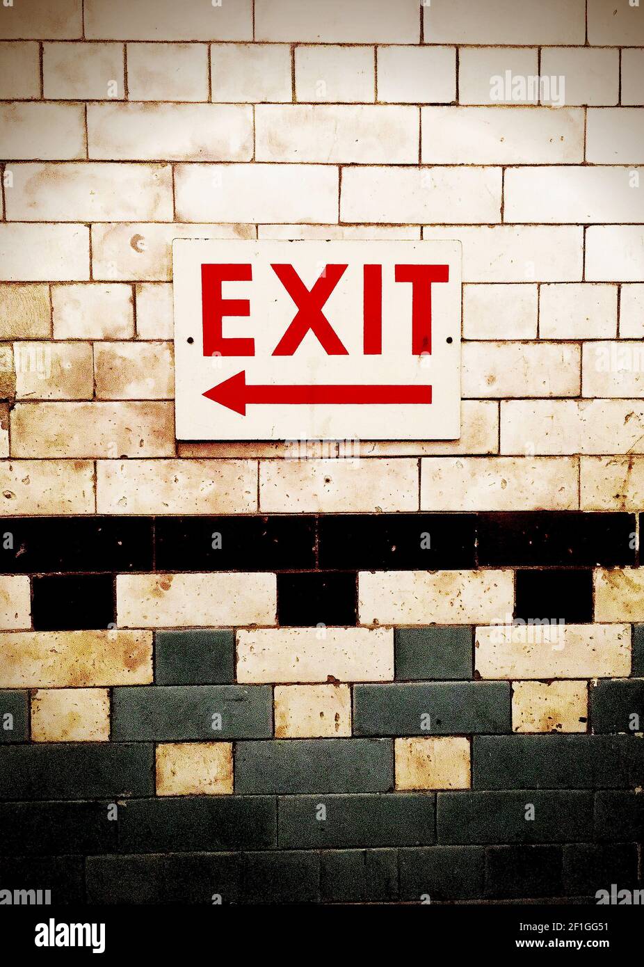 Exit Sign on Tiles Stock Photo - Alamy