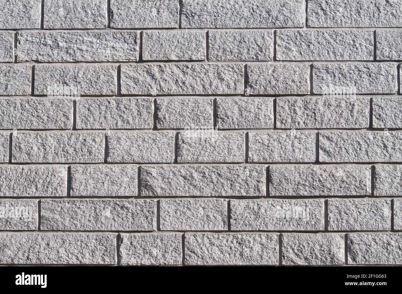 Beautiful grey stone wall background texture with different shapes ...