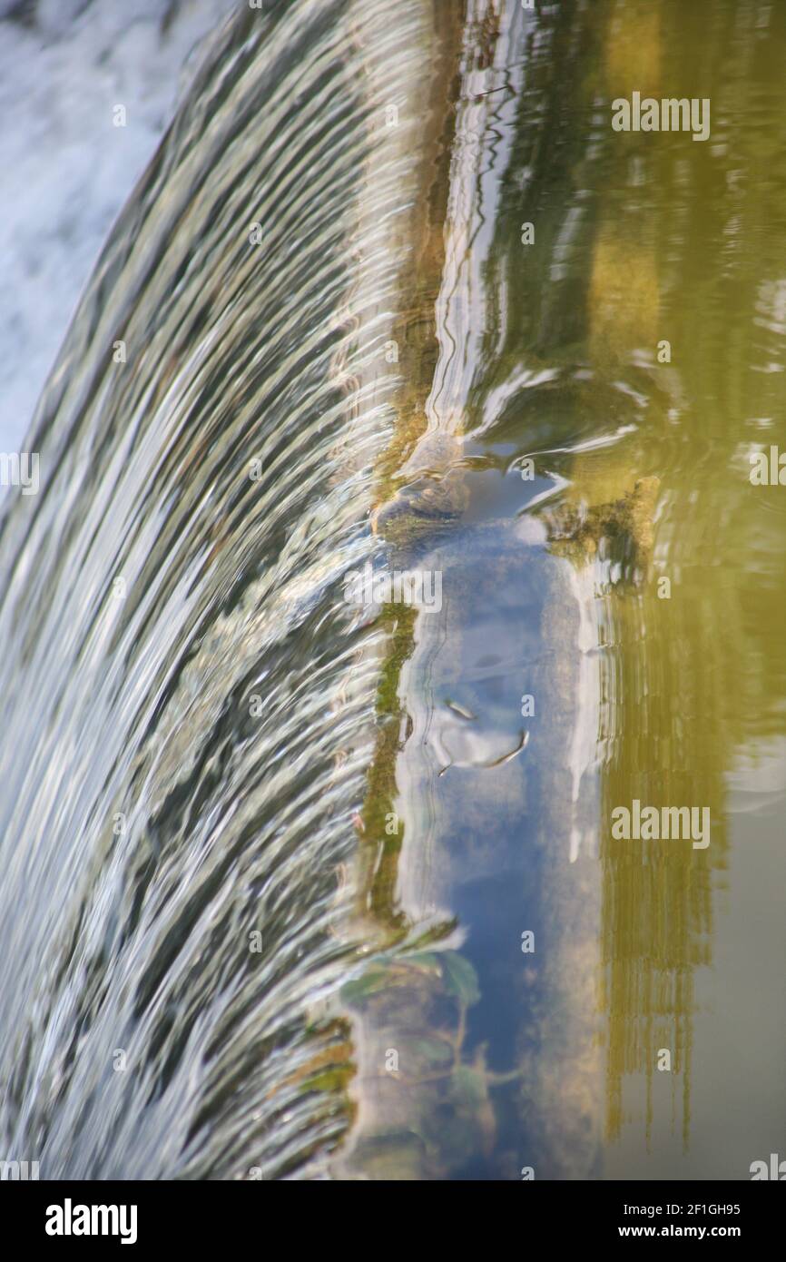top part of dam with the falling water Stock Photo - Alamy