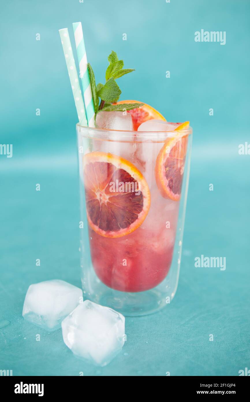 Cold cocktail with blood orange Stock Photo - Alamy